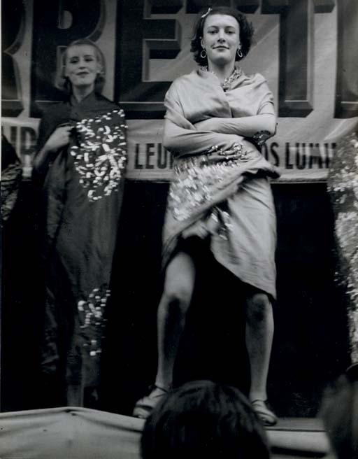 Conchita on Display in Front of the Booth, c. 1931 by Brassaï | Art.Salon