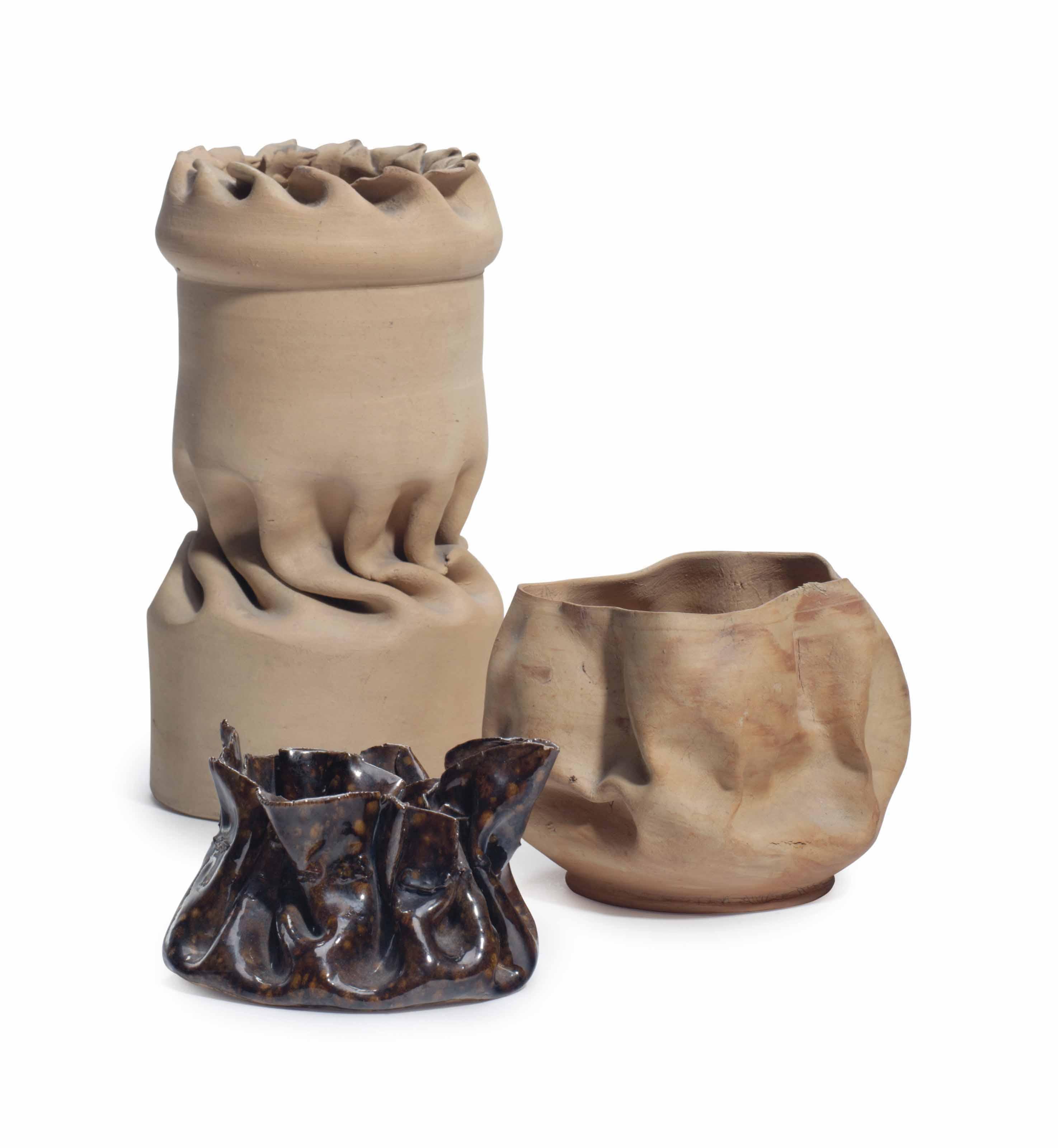 A GROUP OF THREE VESSELS, CIRCA 1900 by George Ohr | Art.Salon